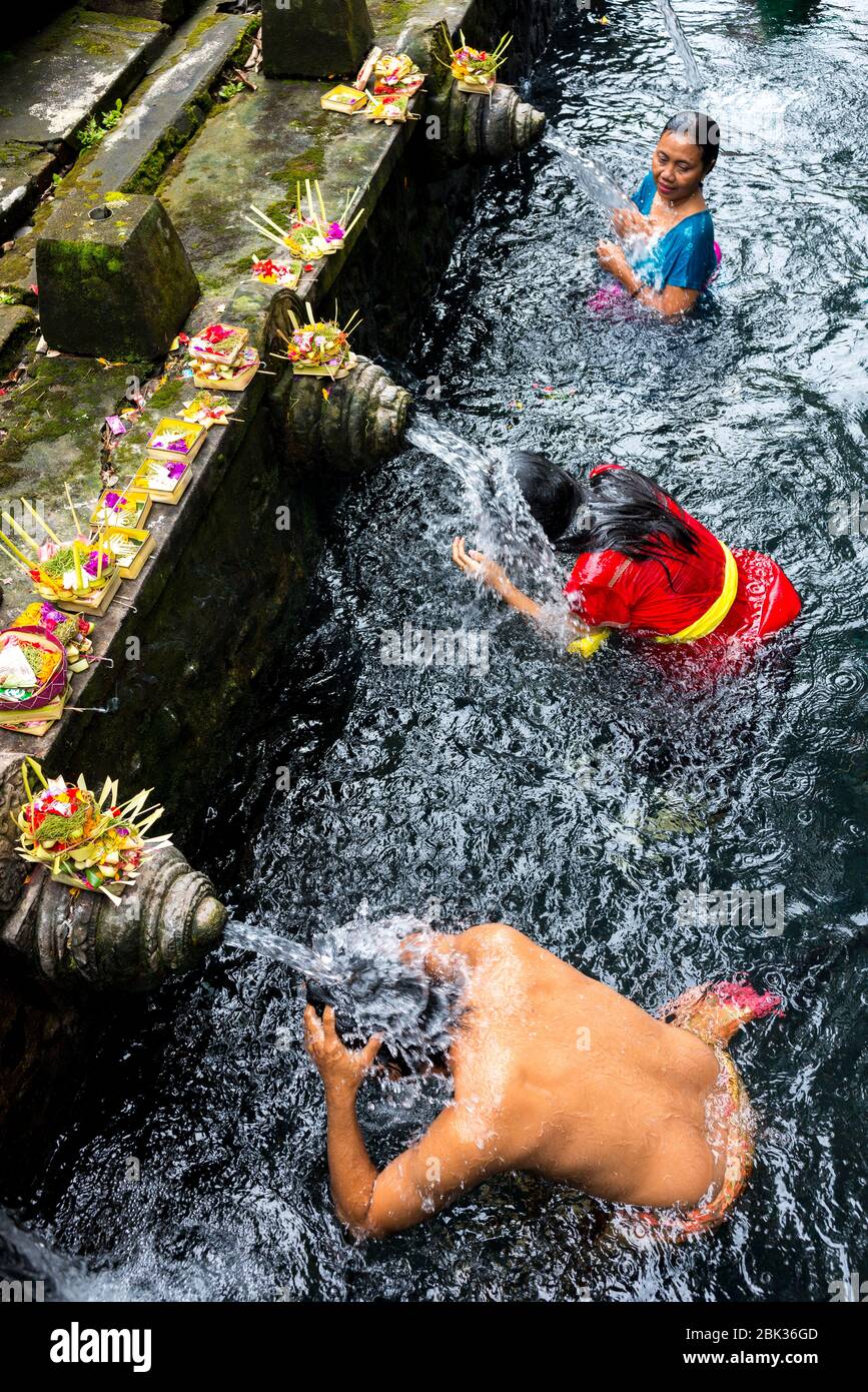 People at the Pura Tirta Empul temple in the village of Manukaya in ...