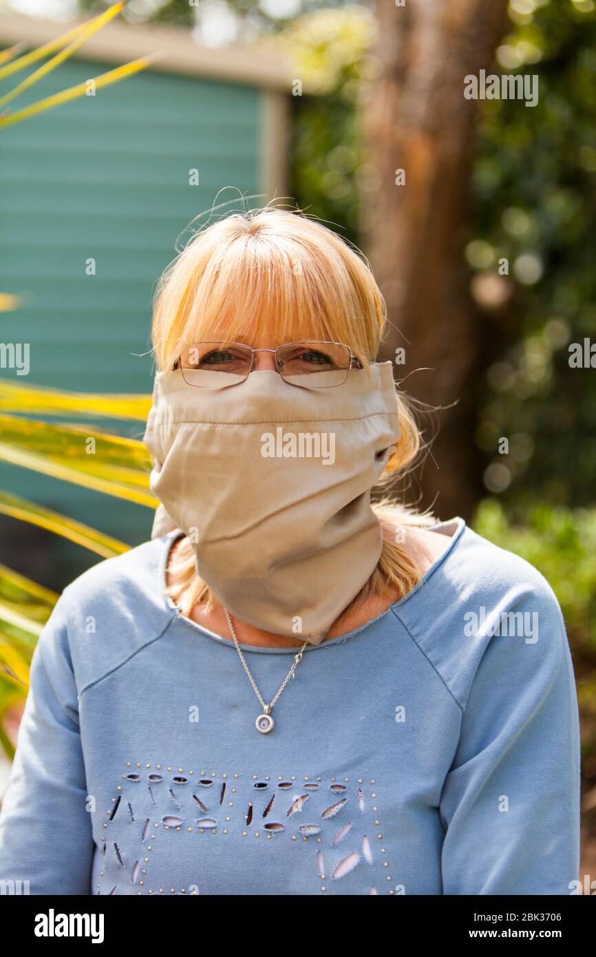 Woman in homemade face mask, homemade face mask, homemade PPE, face ...