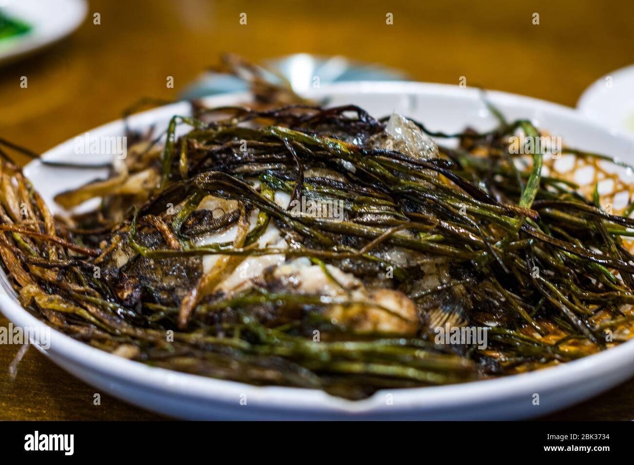 Scallion wrapped cod head (opium fish head) at Old Jesse restaurant on ...