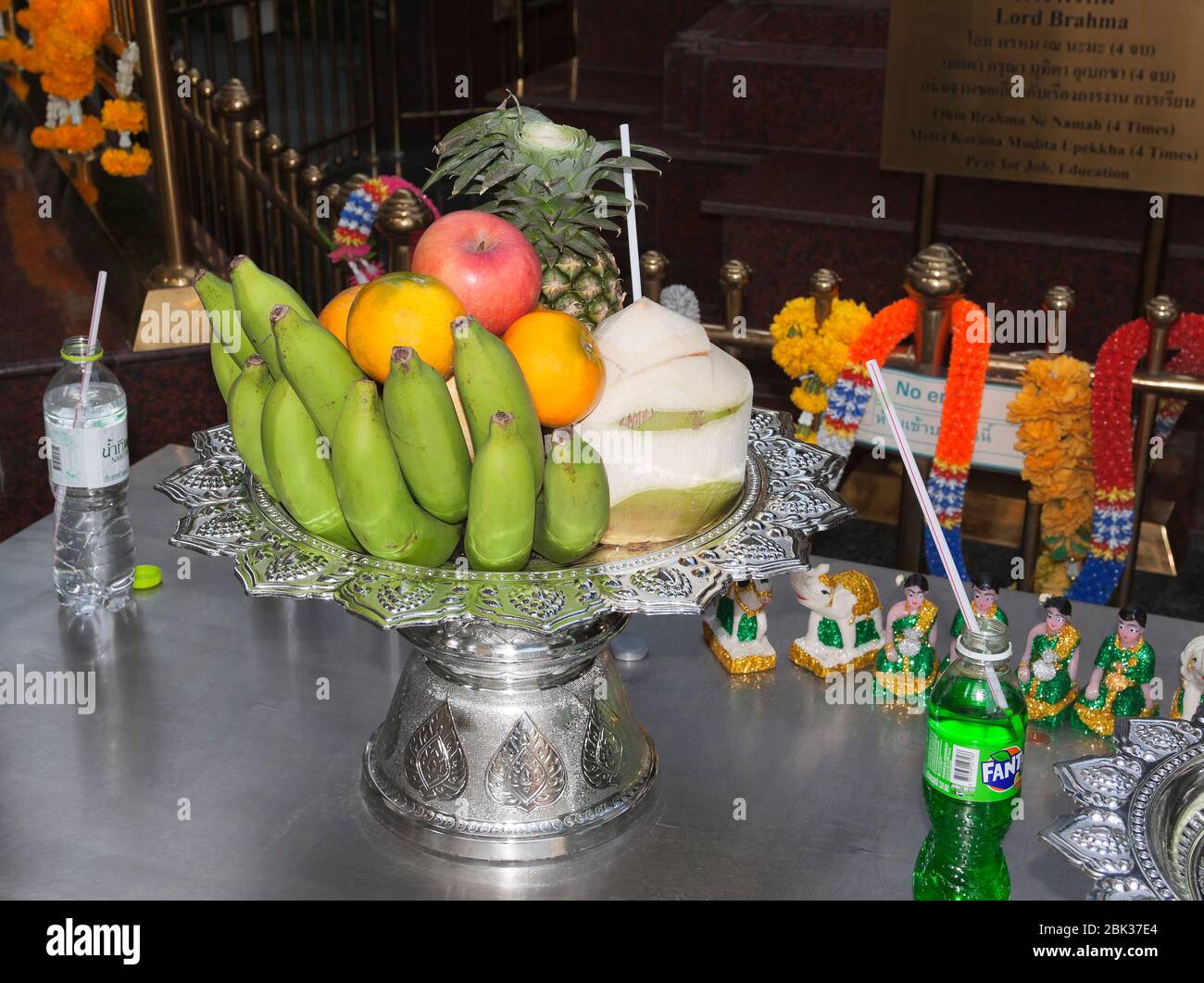 God donation for Brahma in Bangkok Stock Photo - Alamy