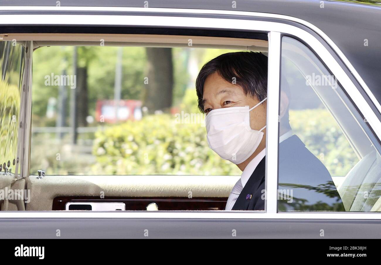 Japanese Emperor Naruhito arrives at the Imperial Palace by car for an ...