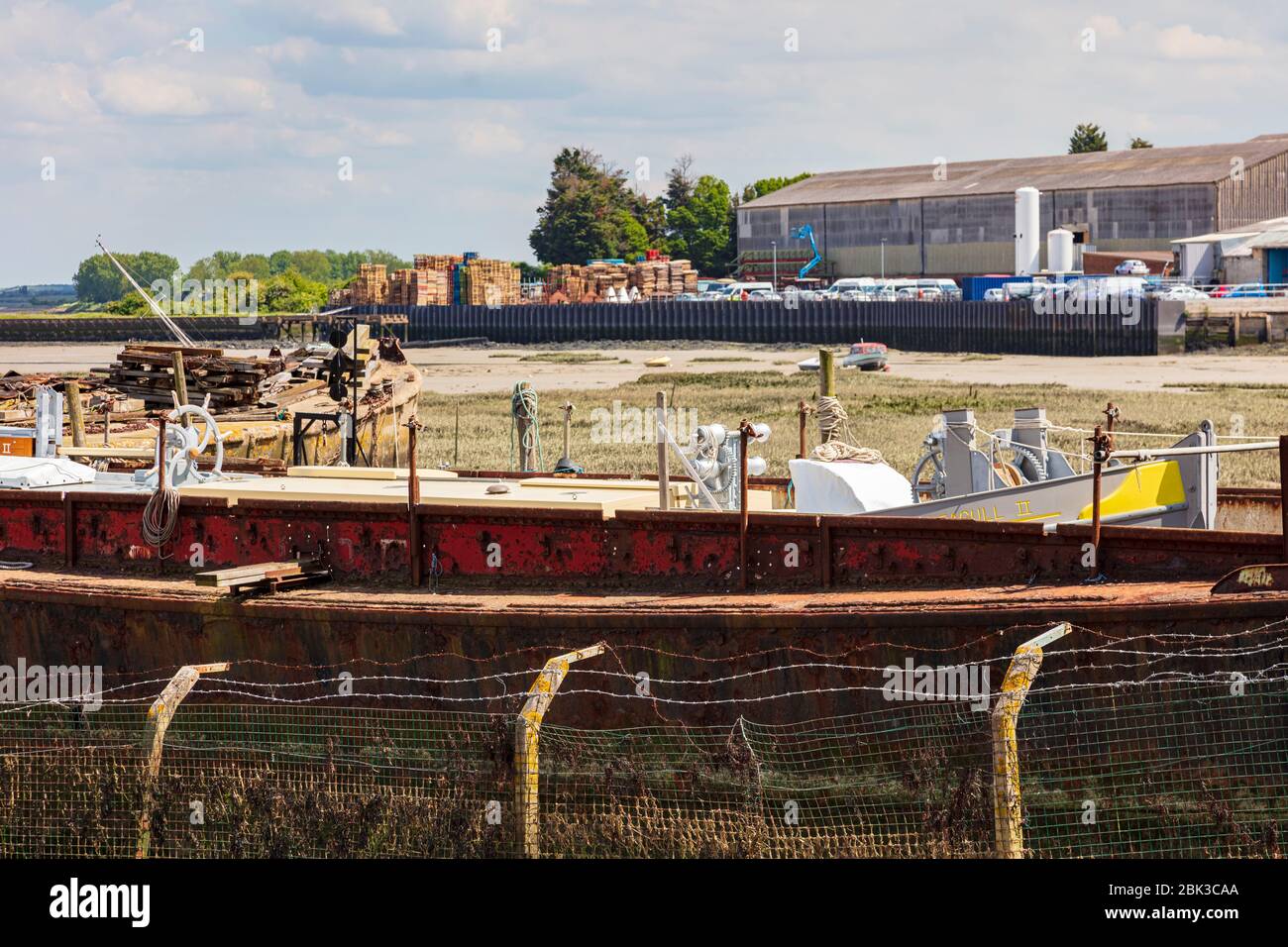 Sunken barges give protection to boats and one is used for a dry dock ...