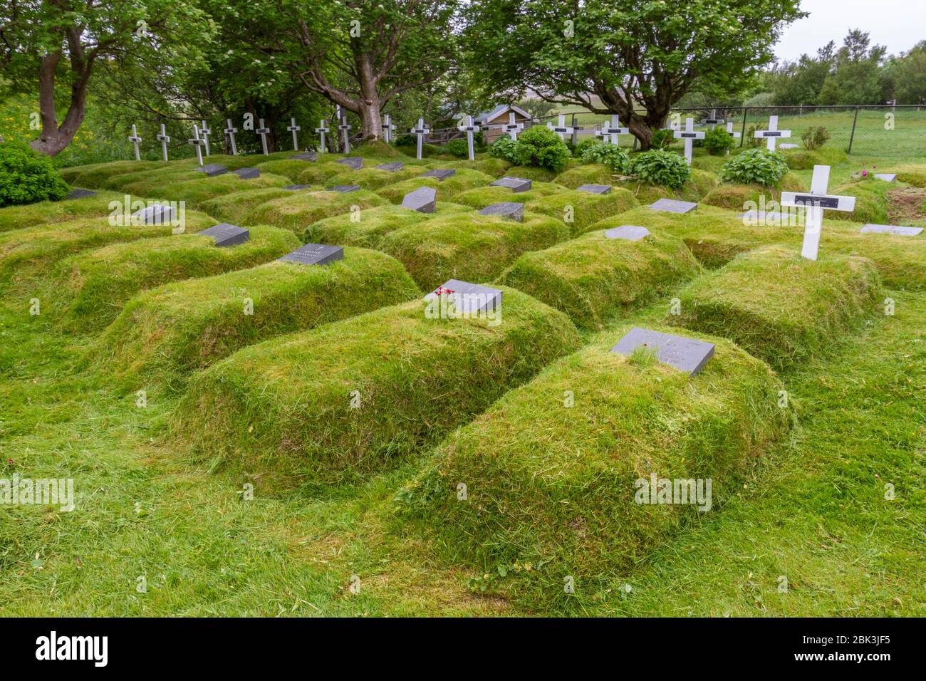 Burial mounds for graves in the Hofskirkja church graveyard, a ...