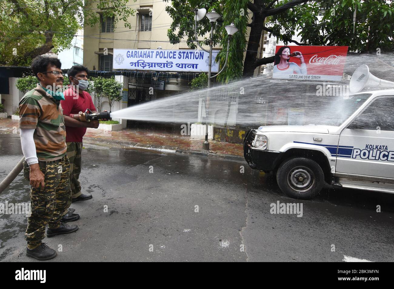 Disaster Management Group sanitizing the Kolkata Police vehicle during ...