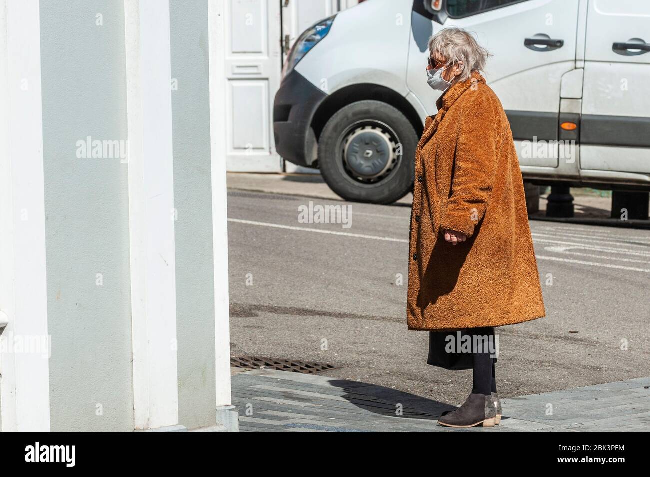 Clonakilty, West Cork, Ireland. 1st May, 2020. A woman wearing a face ...