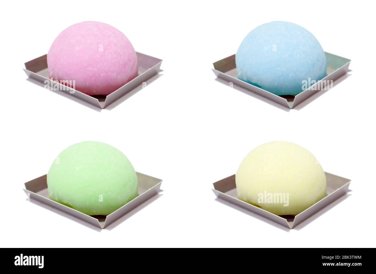 A set of four colourful mochi isolated on white background. Yellow ...