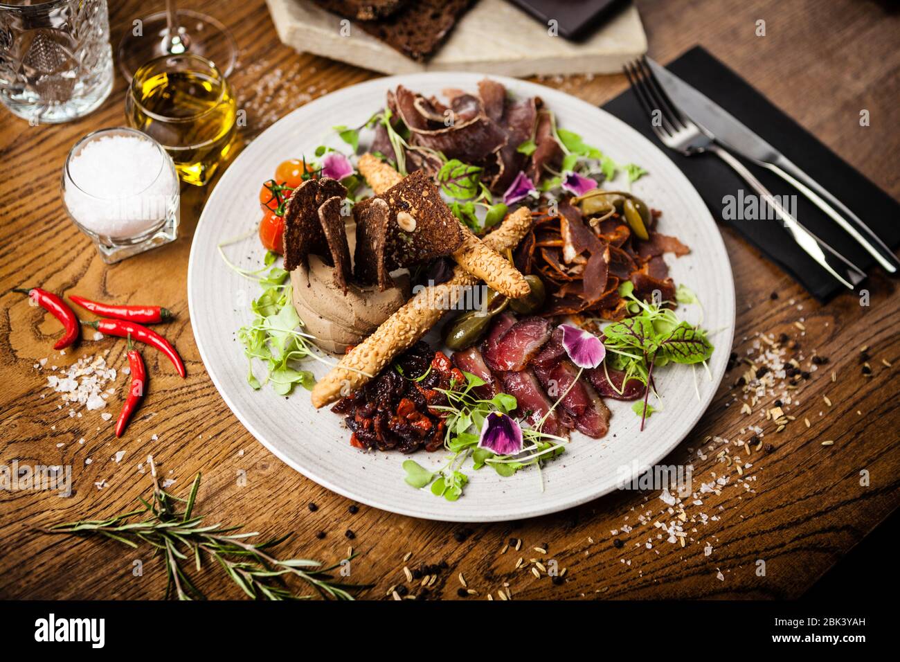 Meat platter for two: Dry-aged beef brisket, duck fillet, beef liver ...