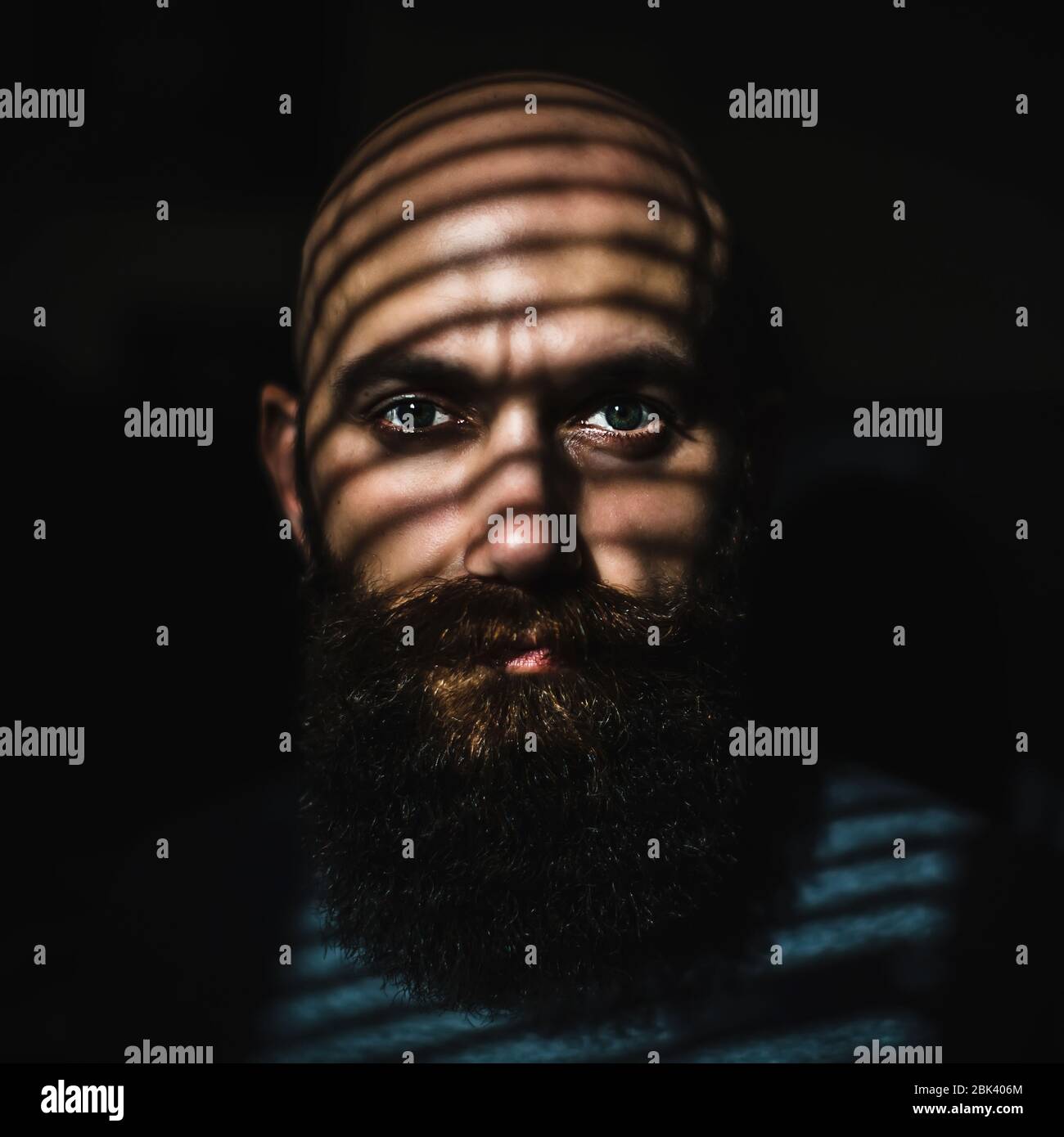 Close-up portrait of middle aged brutal bearded man with expressive ...