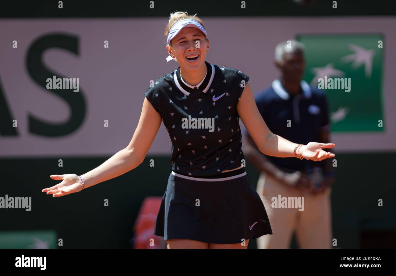 Amanda Anisimova of the United States reacts to winning her quarter ...