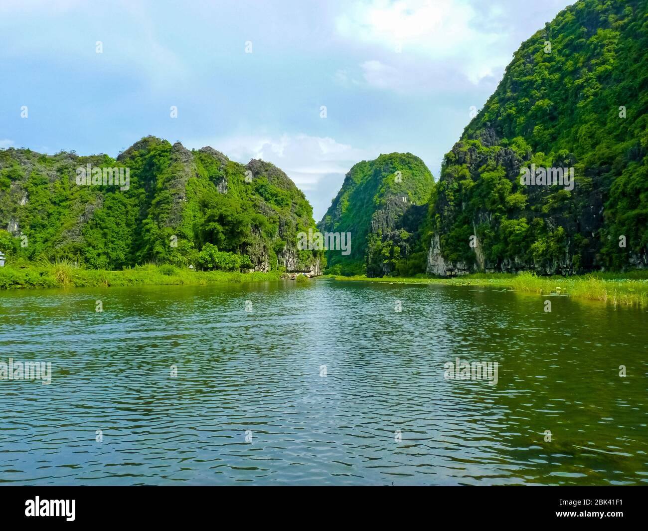 Quiet Ride On Peaceful Tam Coc River, Ninh Binh, Vietnam Stock Photo ...