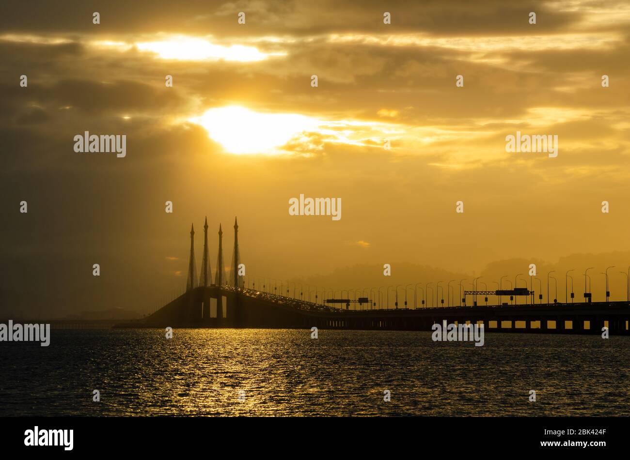 Silhouette sunray at Penang Bridge Stock Photo - Alamy