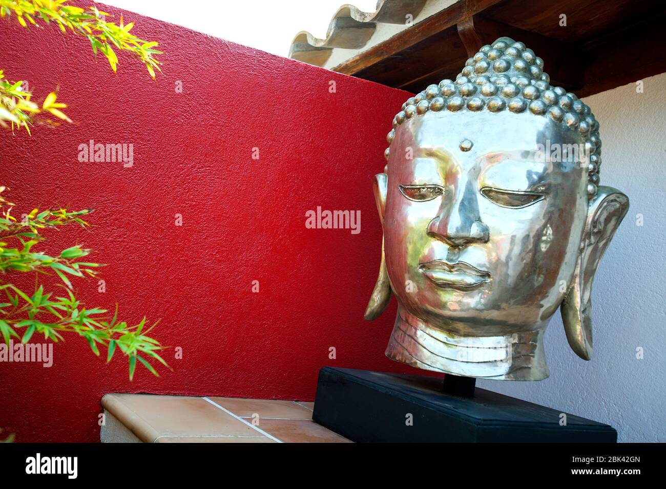 Buddha head metal cast Stock Photo - Alamy