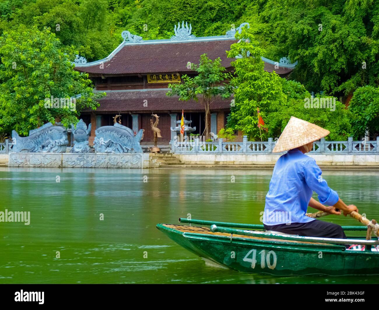 Quiet Ride On Peaceful Tam Coc River, Ninh Binh, Vietnam Stock Photo ...