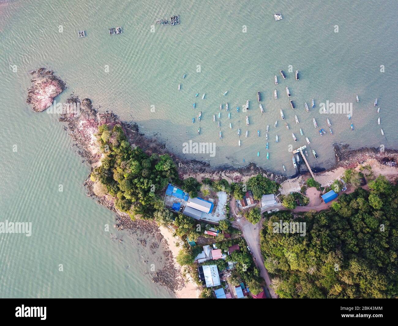 Aerial fishing village near the rock sand coastal at Pulau Sayak Stock ...