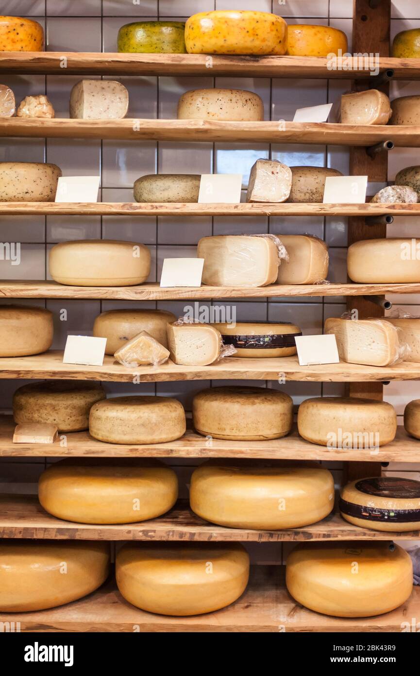 Traditional Dutch cheese displayed for sale in an Amsterdam shop in the ...