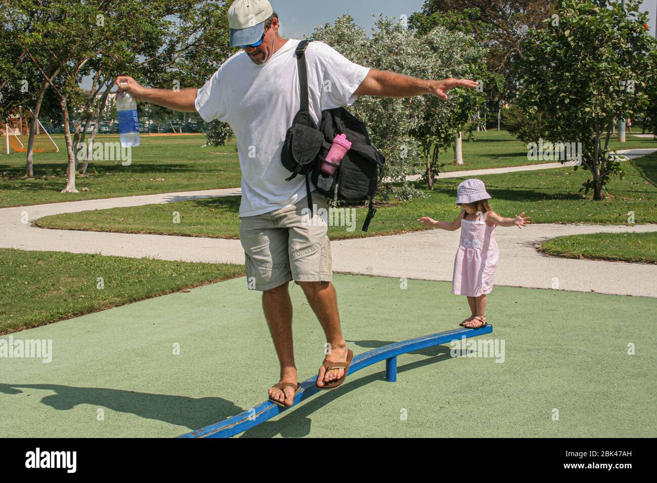 Father and daughter playing at the playground Stock Photo - Alamy