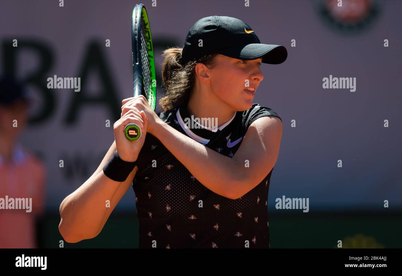 Iga Swiatek of Poland in action during her third-round match at the ...