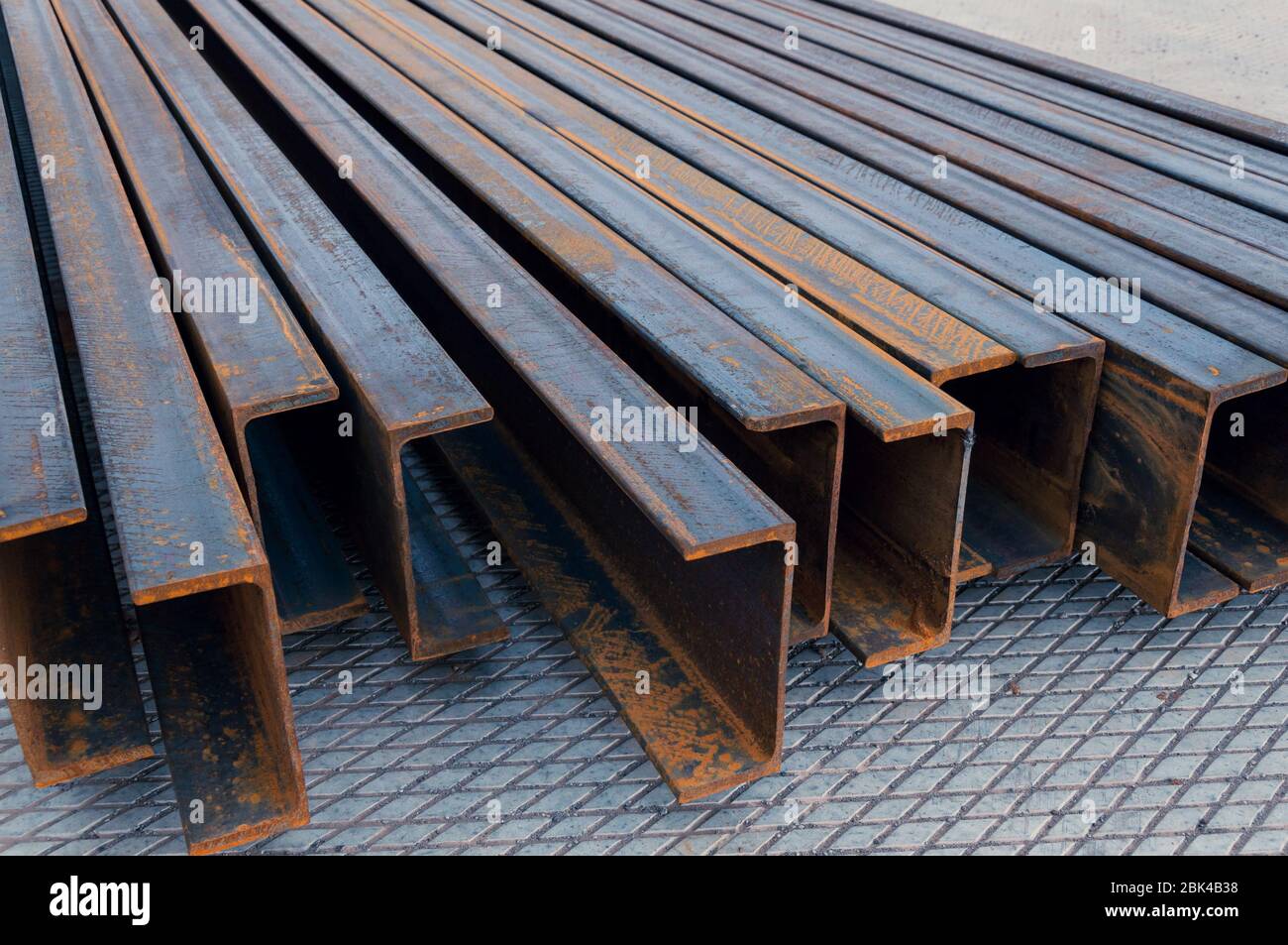 Metal profile beam in packs at the construction site. Material for ...