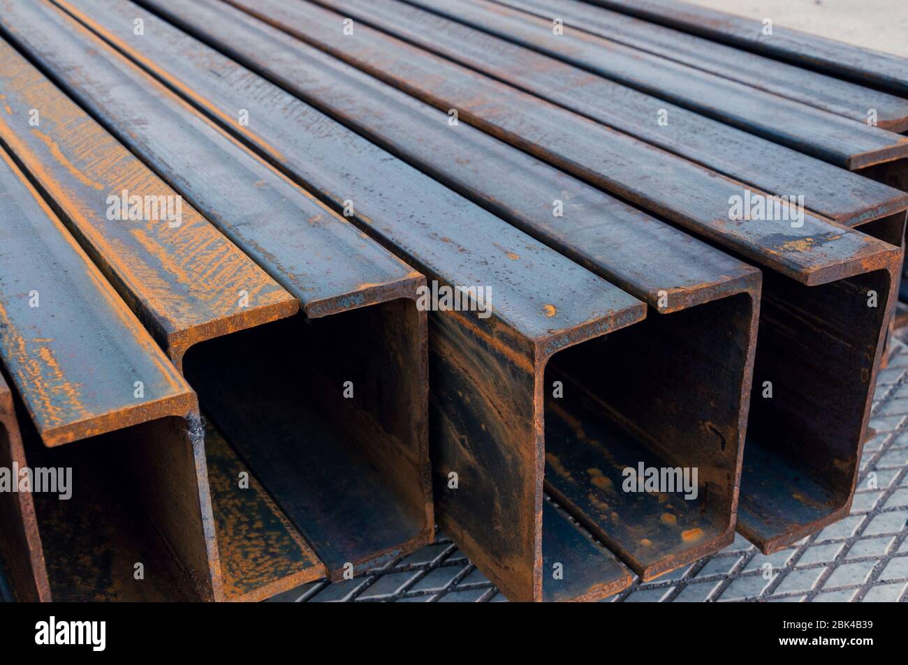Metal profile beam in packs at the construction site. Material for ...