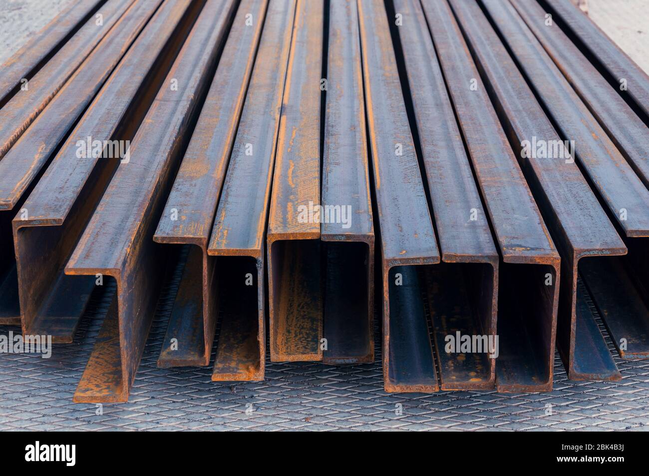 Metal profile beam in packs at the construction site. Material for ...