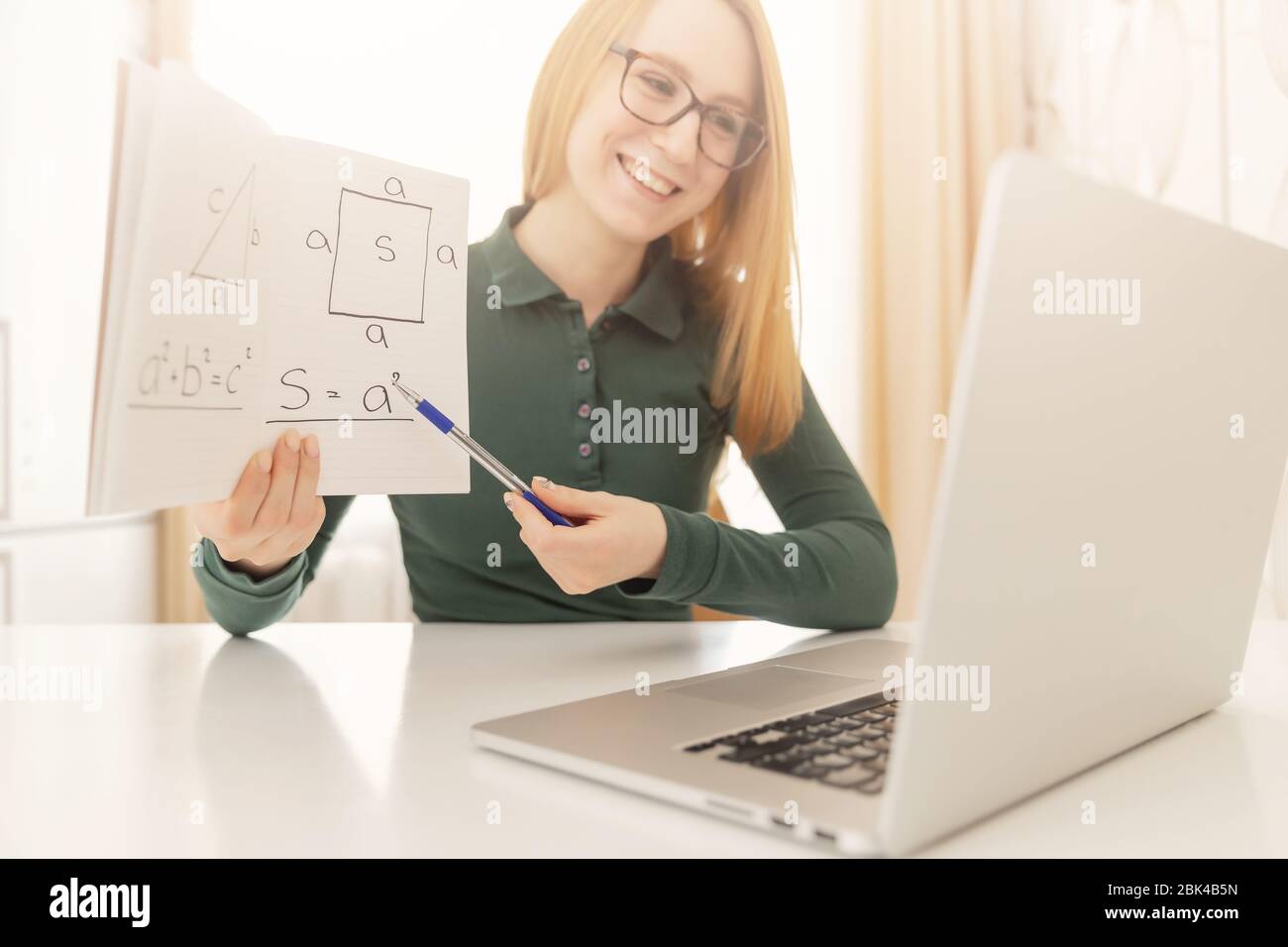 Math teacher explains online lesson to students School quarantine ...