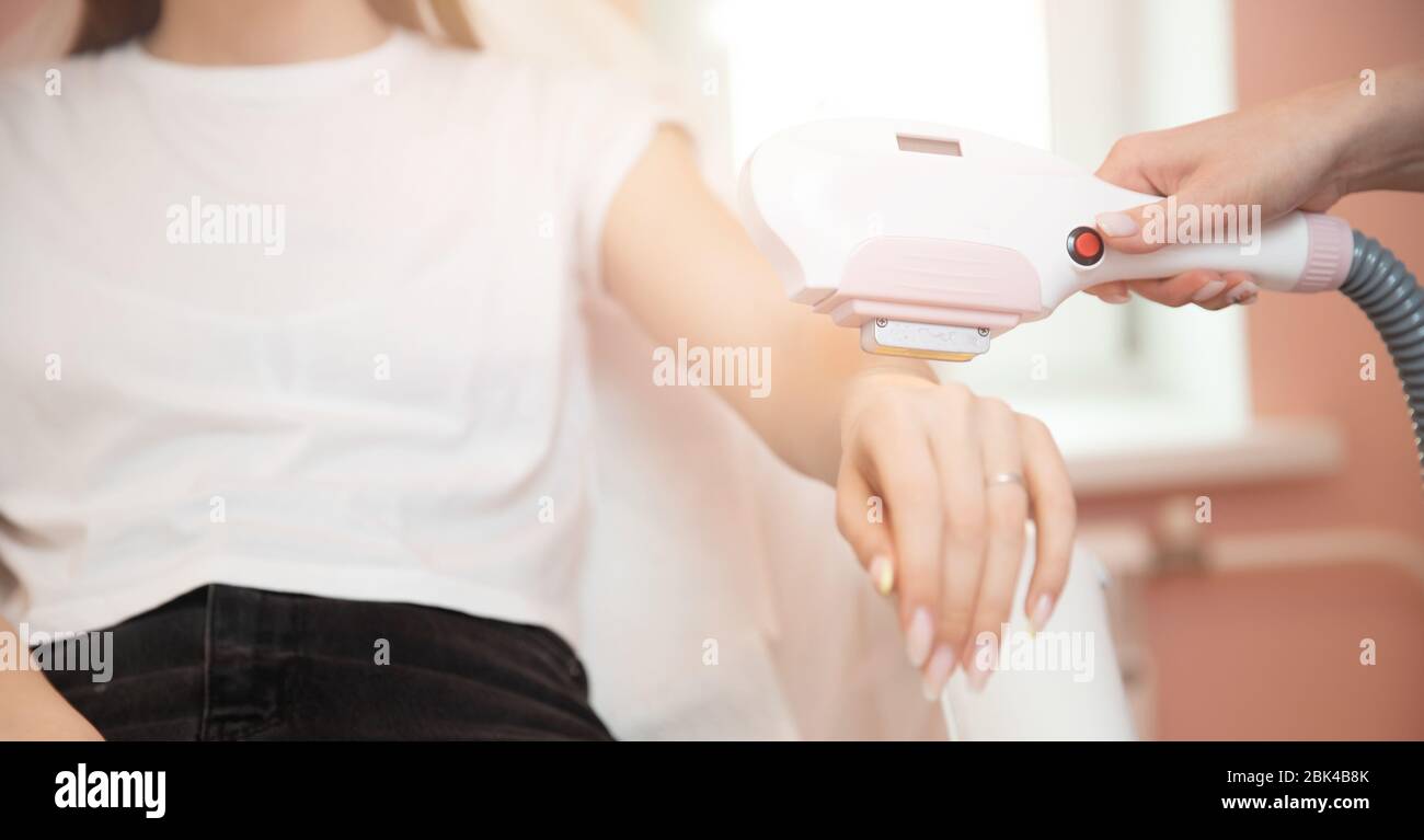 Laser removal Epilation Hair on hand arm young woman. Health and beauty ...