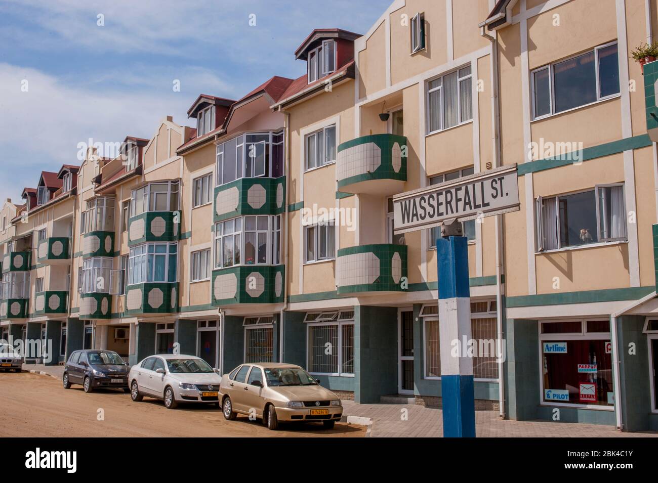 Street scene with apartment buildings in downtown Swakomund, Namibia ...