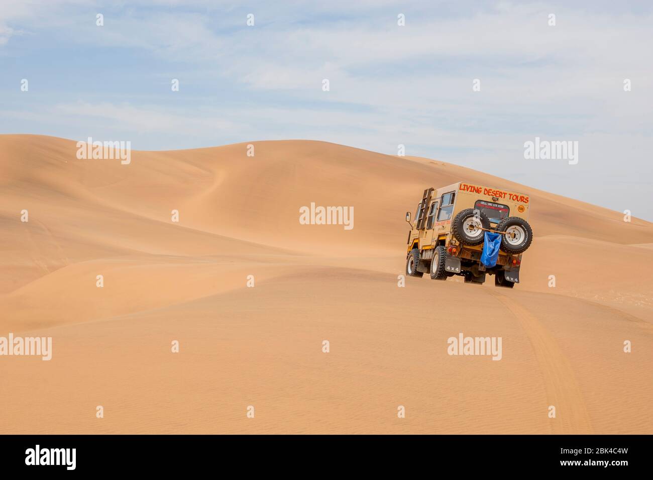 Exploring the sand dunes of the Namib Desert with a four wheel drive ...