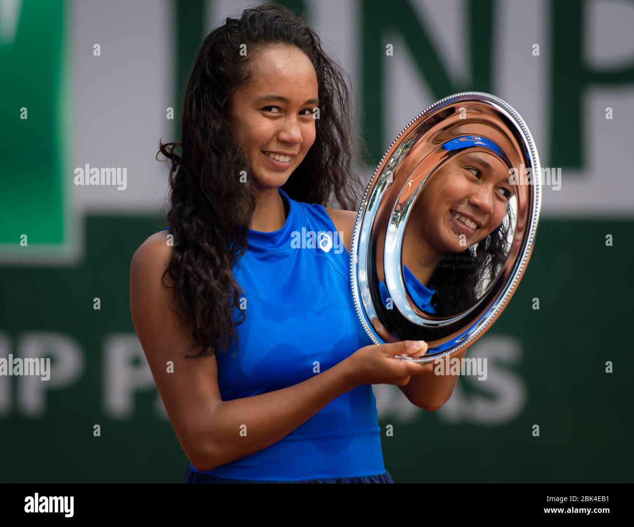 Leylah Annie Fernandez of Canada poses with the Junior Champions trophy ...