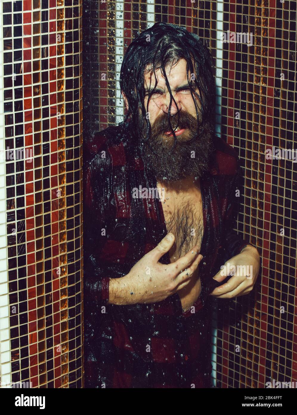 Handsome man, bearded hipster with beard and moustache in red checkered ...