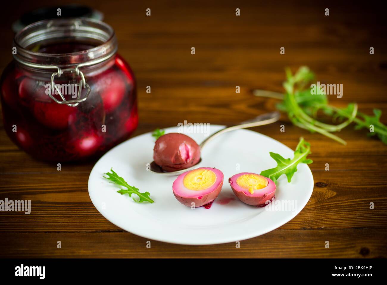 marinated chicken eggs in beetroot marinade in a plate Stock Photo - Alamy