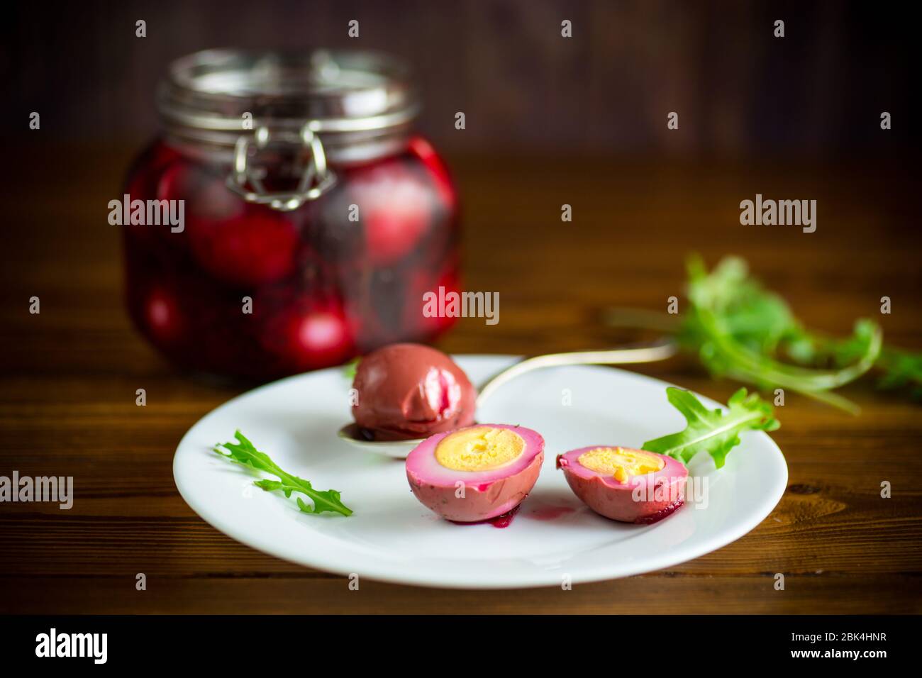 marinated chicken eggs in beetroot marinade in a plate Stock Photo - Alamy