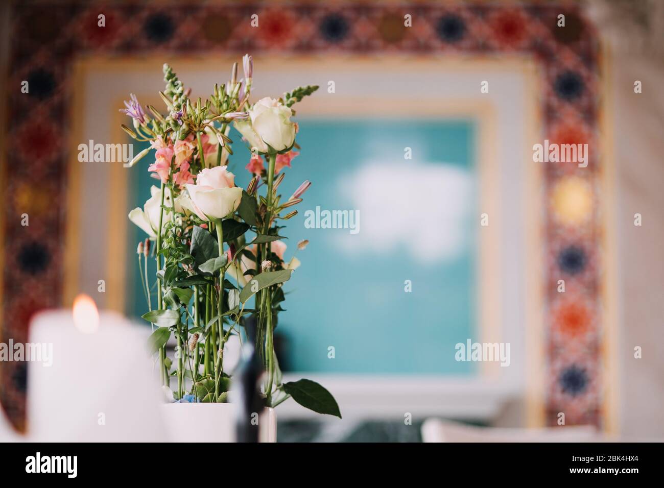 photo of flowers in a vase inside Stock Photo - Alamy