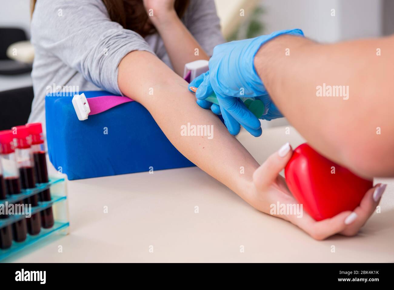 Young woman in the blood transfusion concept Stock Photo - Alamy