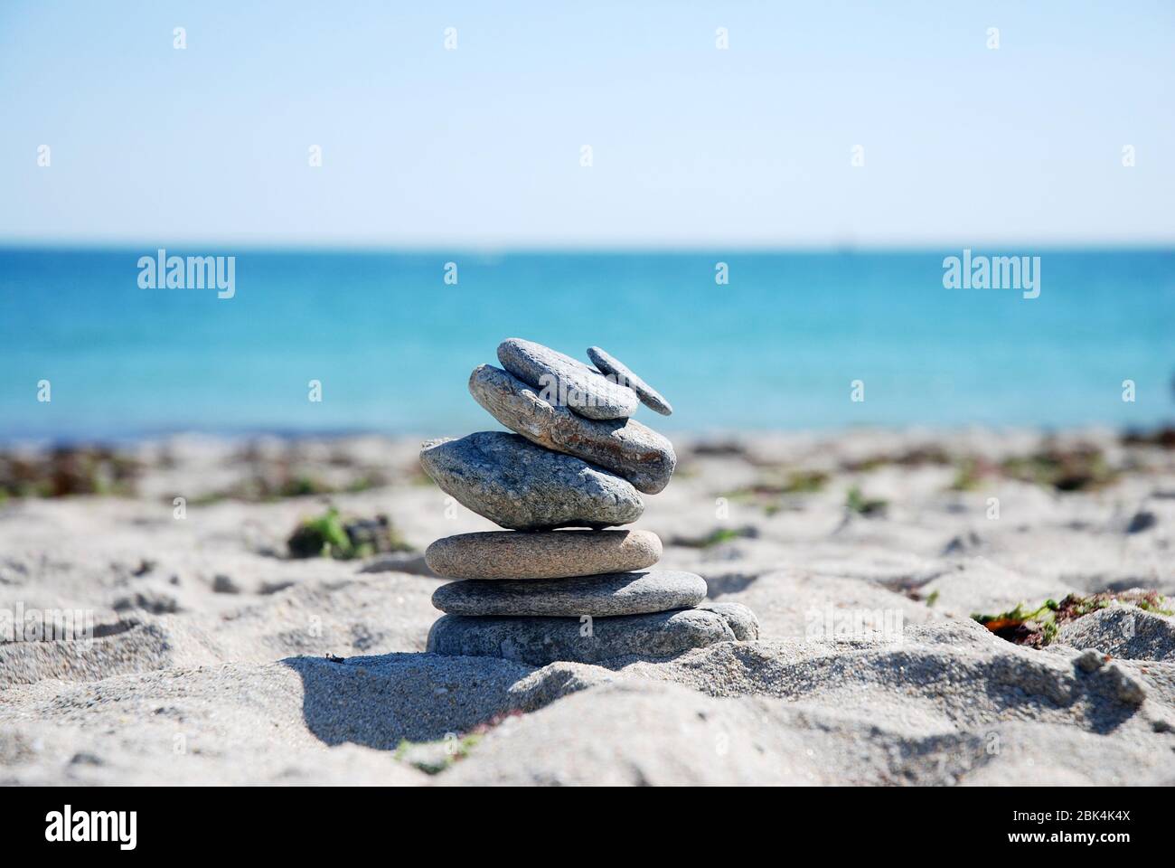 Zen concept stones at the ocean Stock Photo - Alamy
