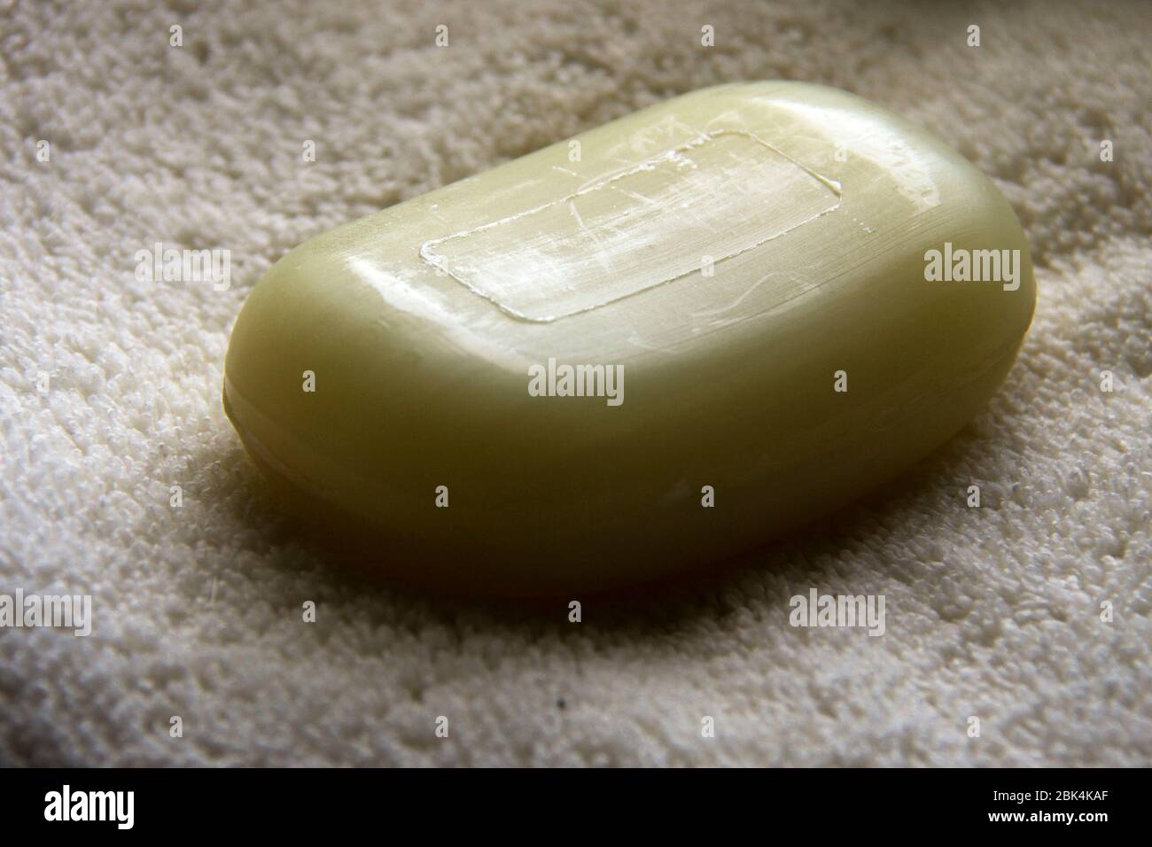 Bar of soap and towel hi-res stock photography and images - Alamy