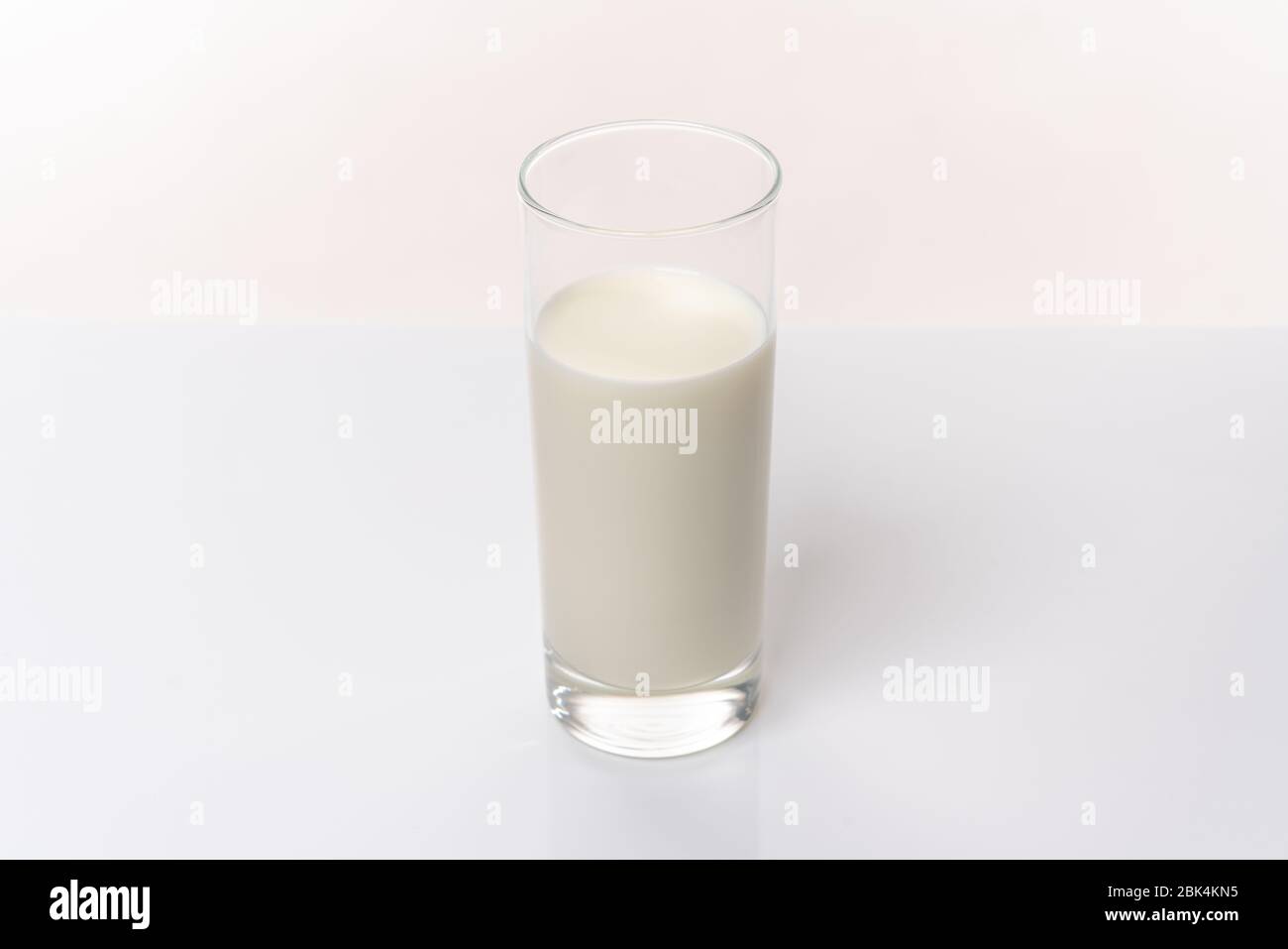 Milk in a glass isolated on white background. Protein rich dairy ...