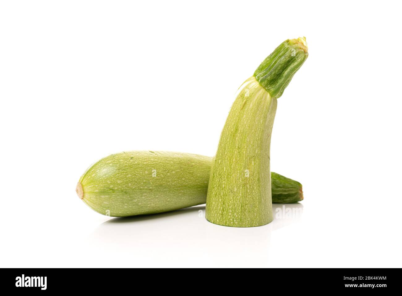 Sliced fresh green squash isolated on white background Stock Photo - Alamy