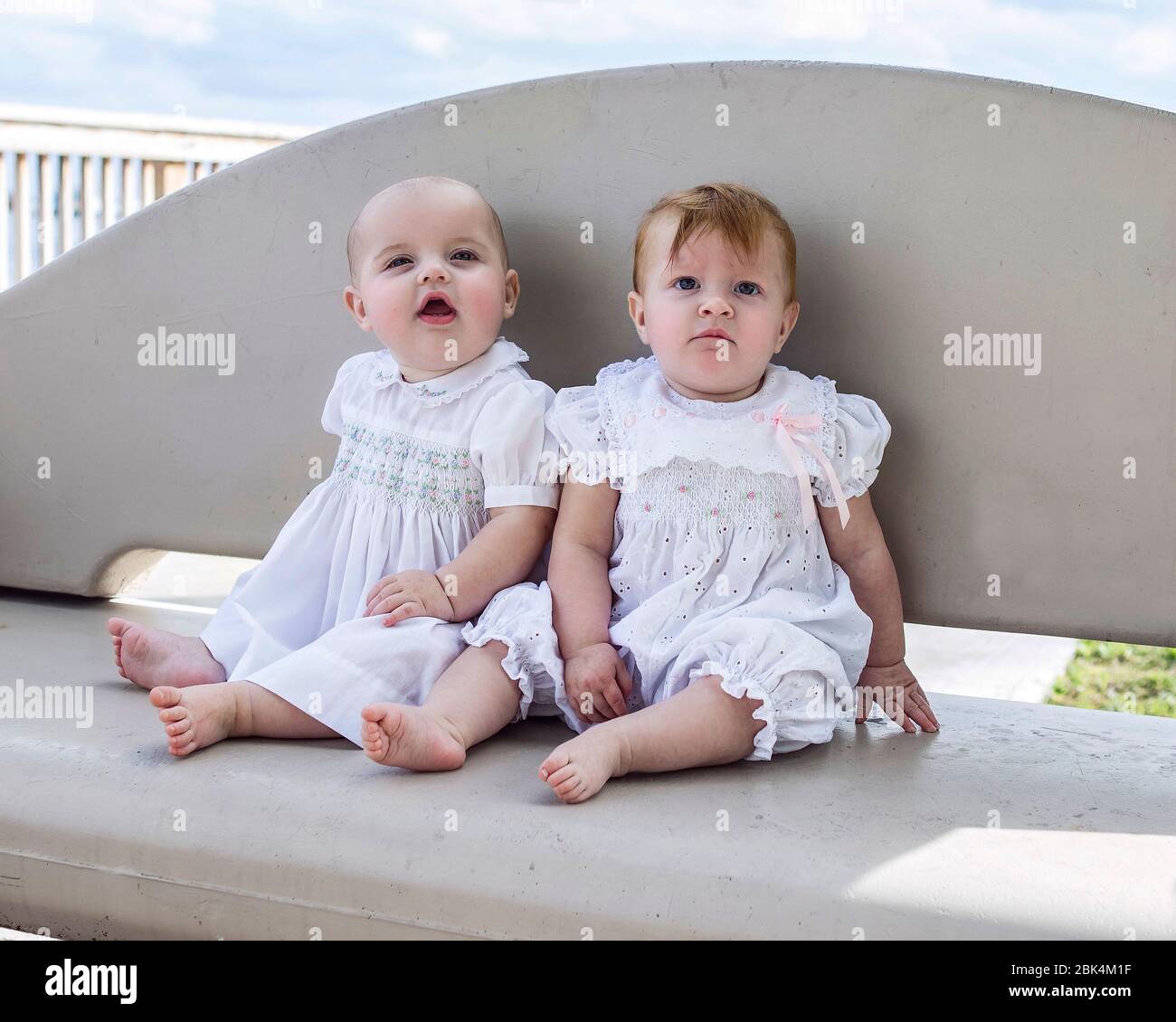 Babies hanging out together in the park Stock Photo - Alamy