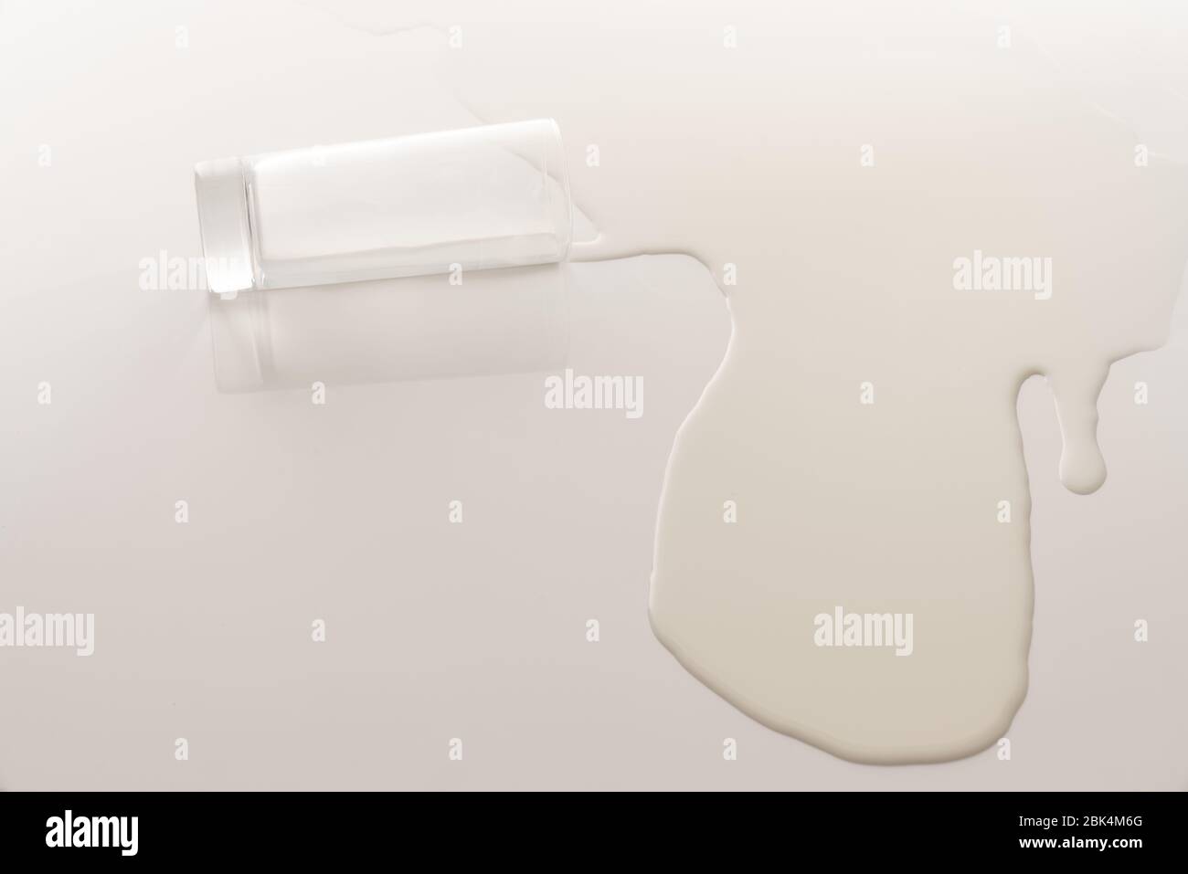 Glass of milk knocked over hi-res stock photography and images - Alamy