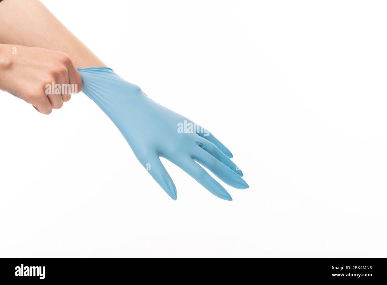 Female hand in blue glove isolated on white background Stock Photo - Alamy
