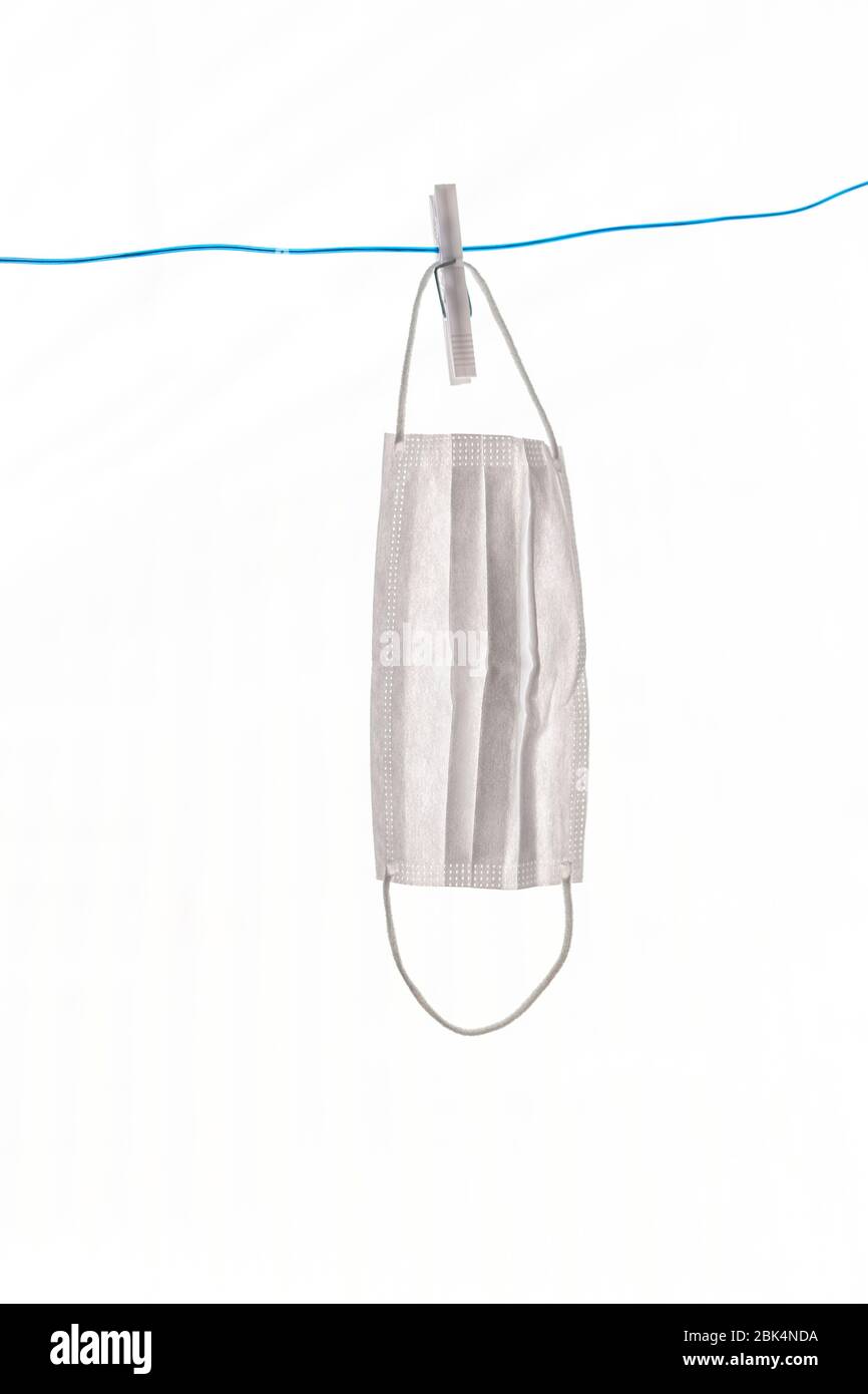 Hanging face masks Cut Out Stock Images & Pictures - Alamy