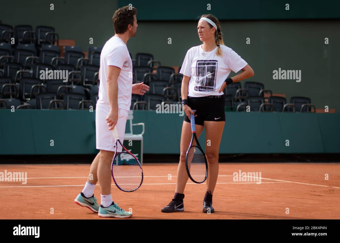 Victoria Azarenka of Belarus and coach Wim Fissette during practice at ...