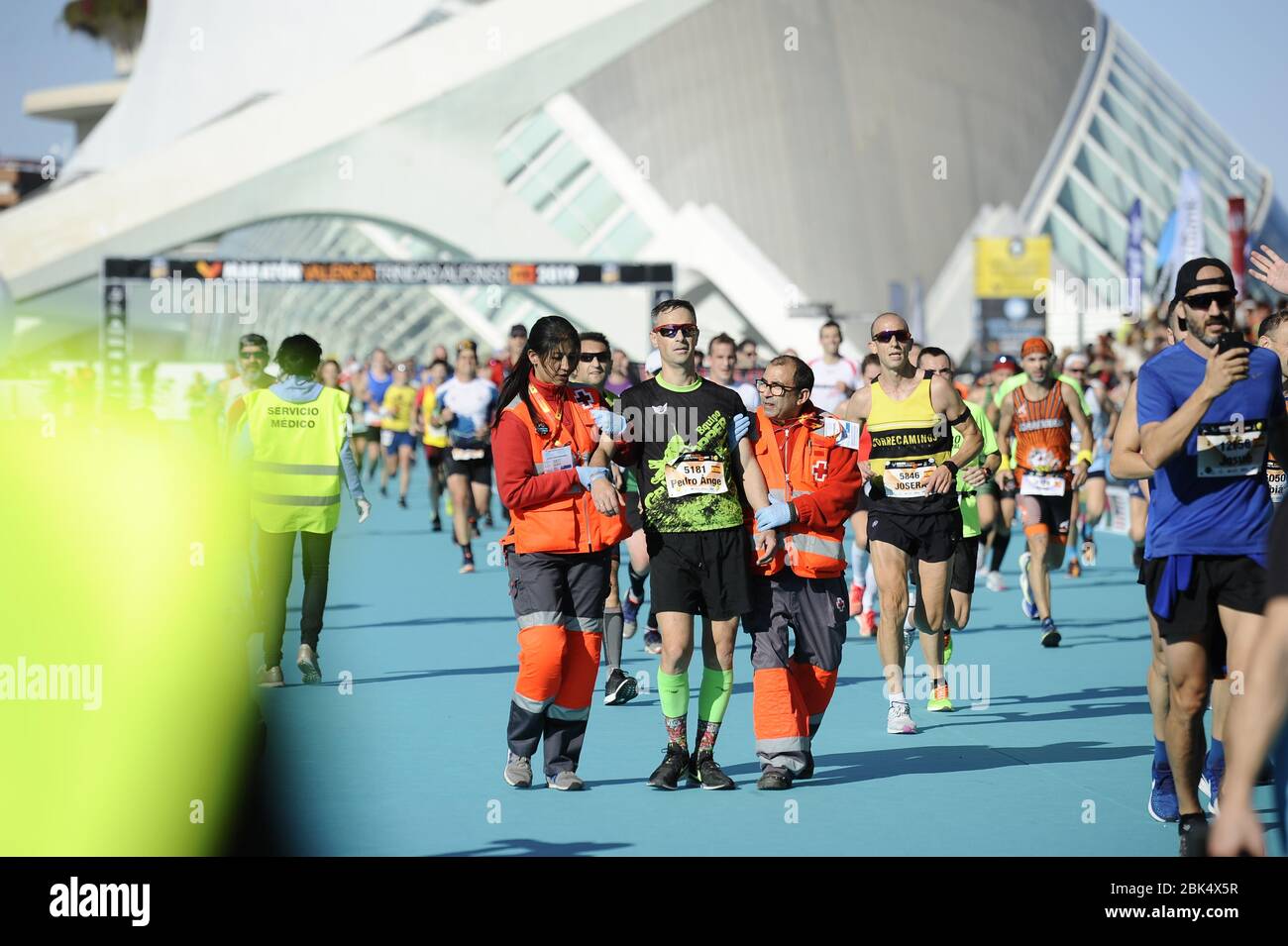 VALENCIA, SPAIN - 1 DECEMBER 2019: exhausted runner at the finish line ...