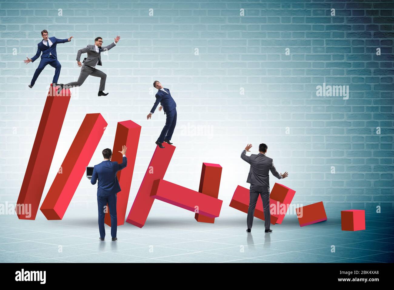 Business people in the collapsing economy concept Stock Photo - Alamy