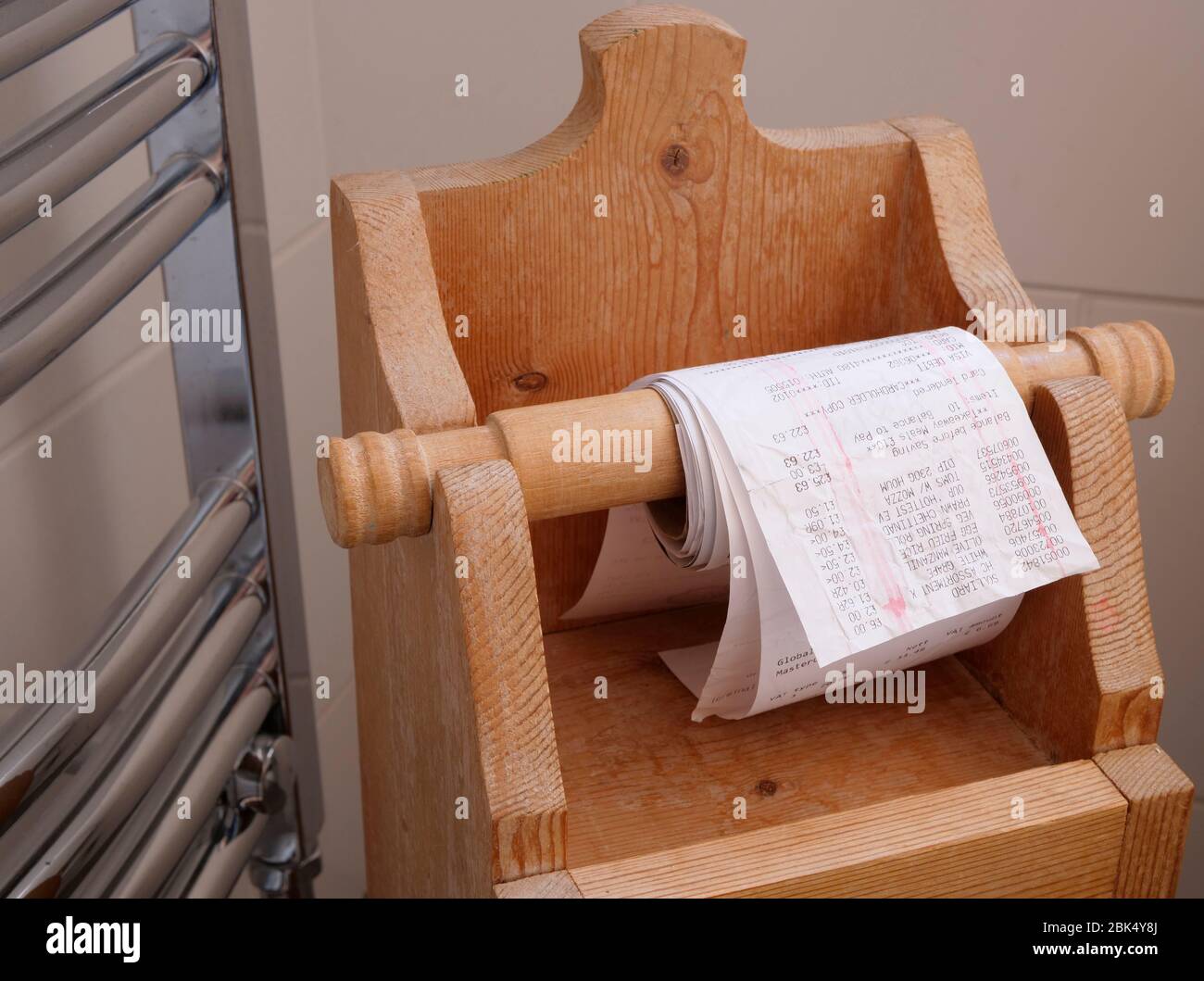 Till receipt sheets showing end of roll red indicating markings, placed ...