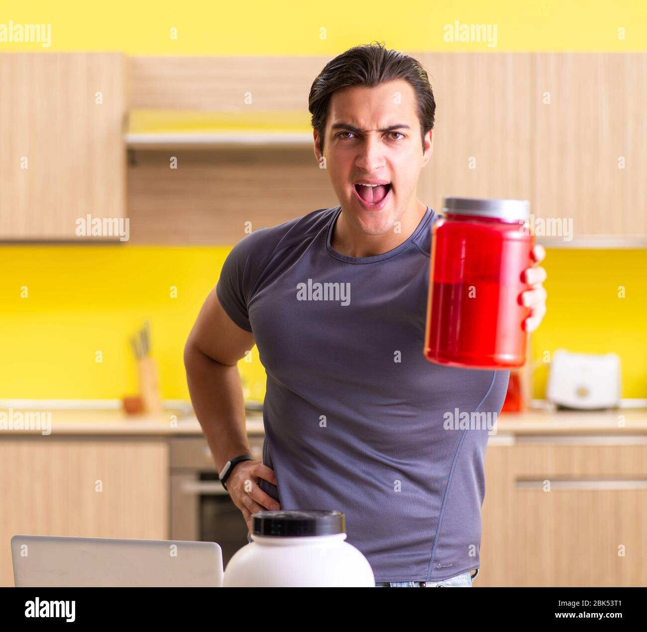 Young man blogging about food additives Stock Photo - Alamy