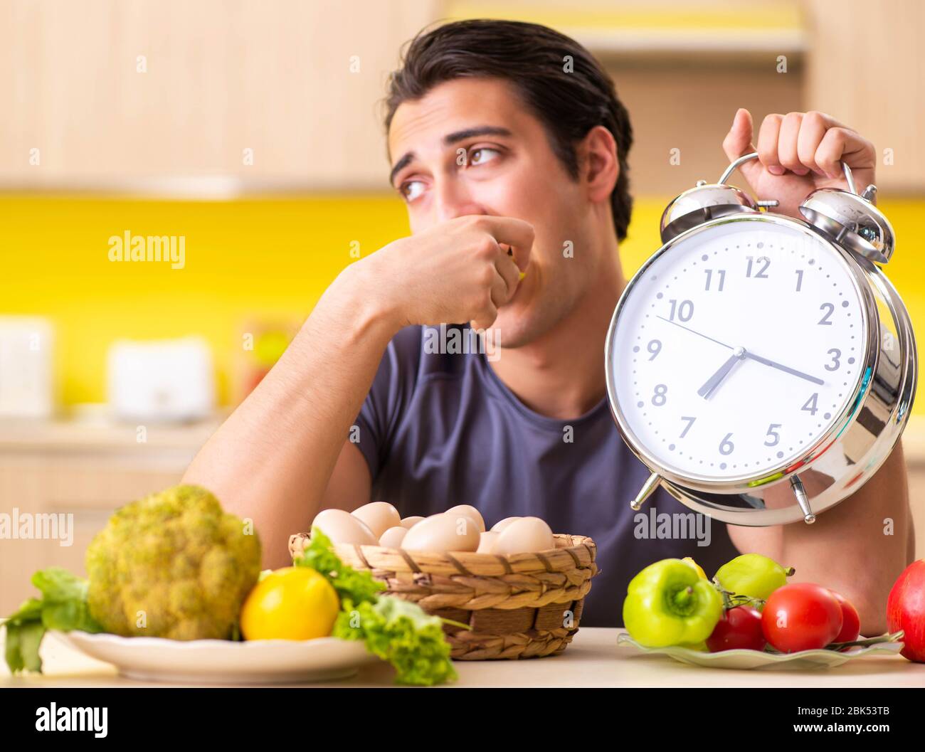 The young man in dieting and healthy eating concept Stock Photo - Alamy