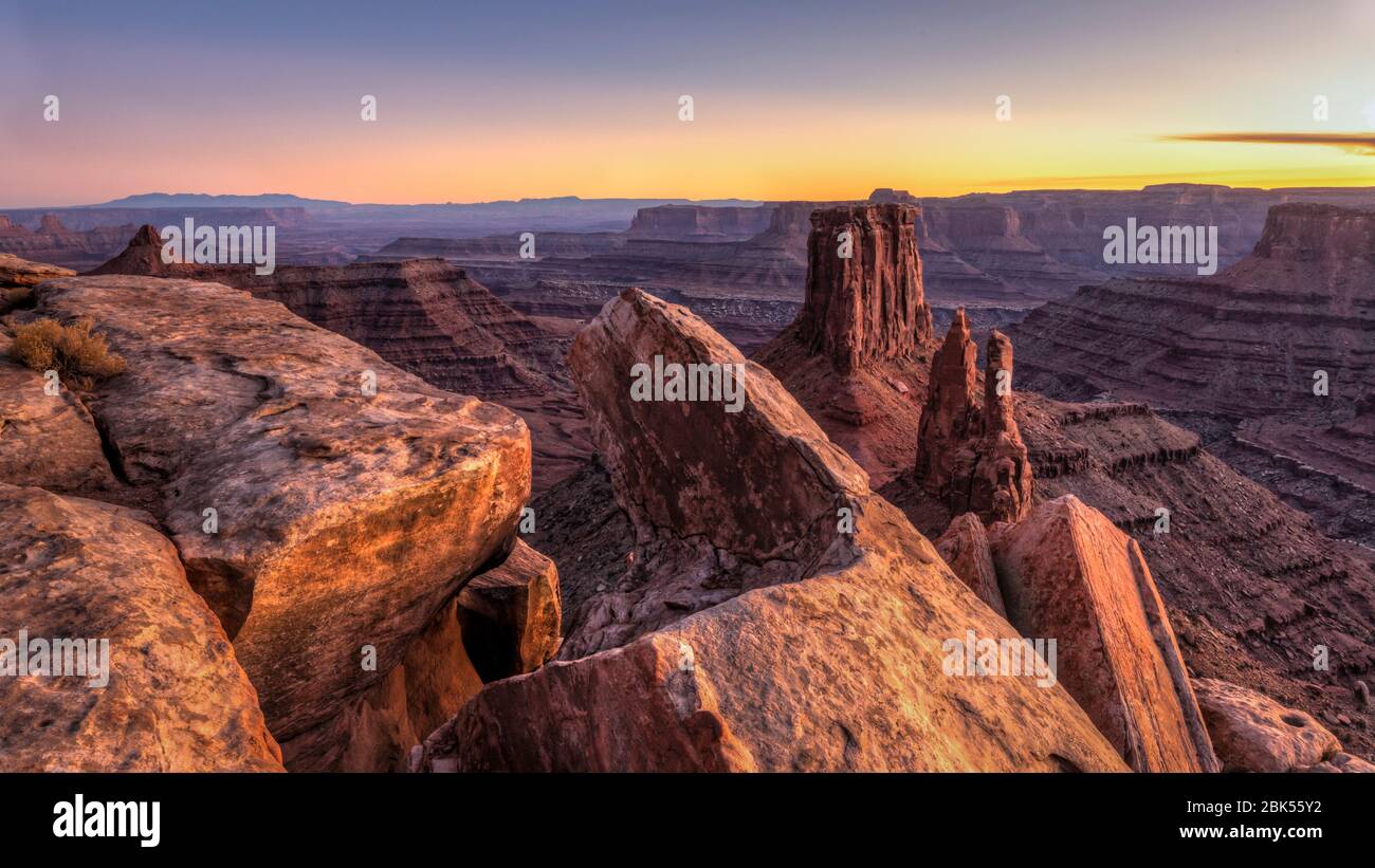A broken cliff on Marlboro Point fronts the iconic double spire and ...