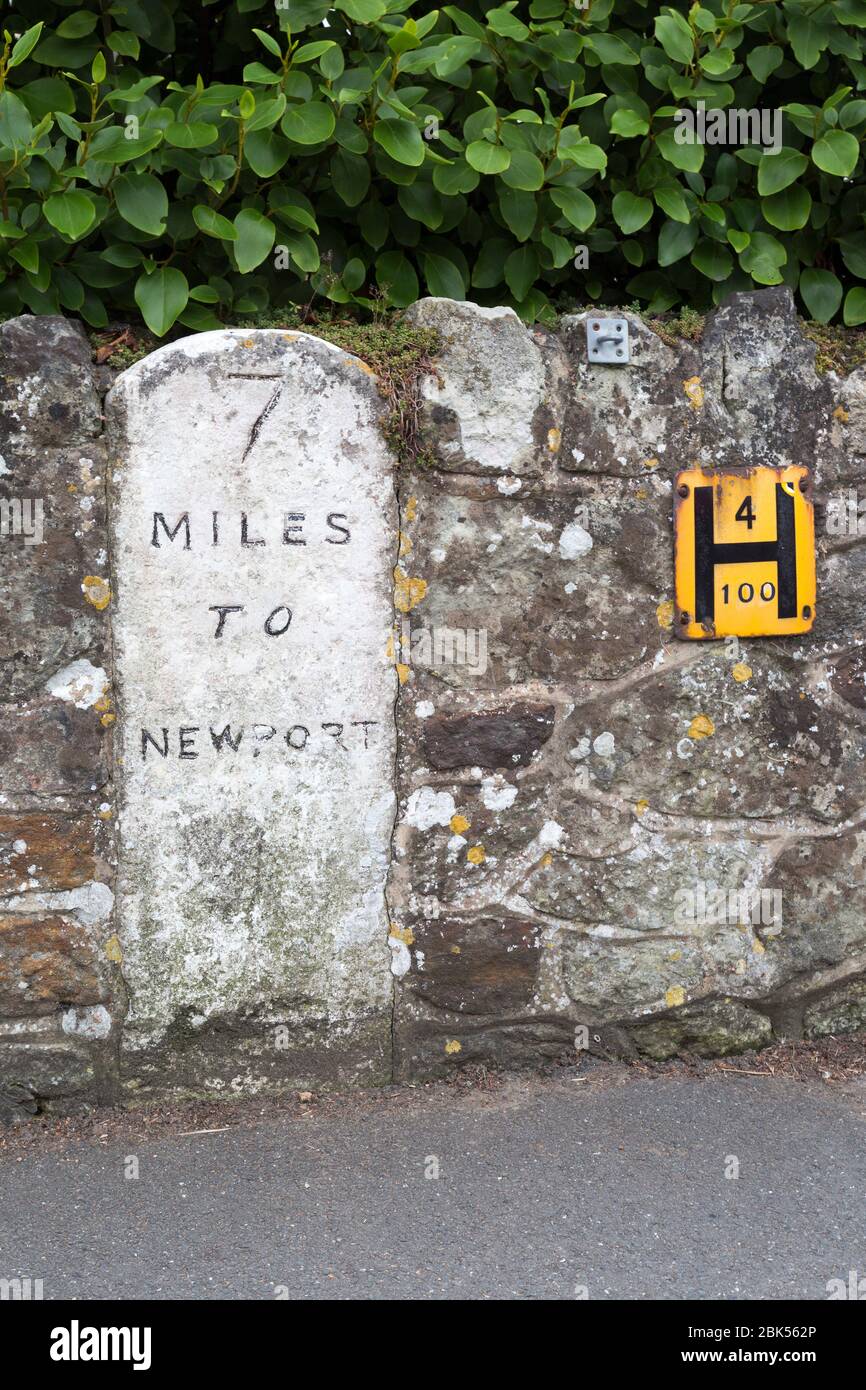Milestone marker 7 miles to Newport built into wall, Brighstone, Isle ...